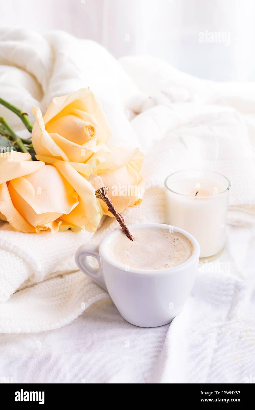 Morning romantic coffee served to bed with bunch of beige roses in ...