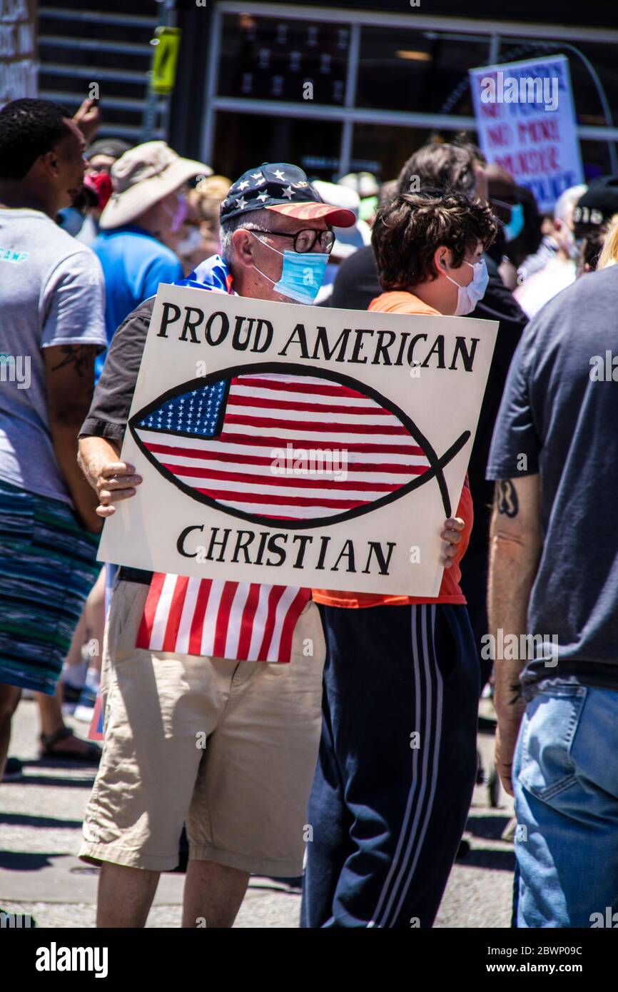 Hold up in crowd hi-res stock photography and images - Alamy