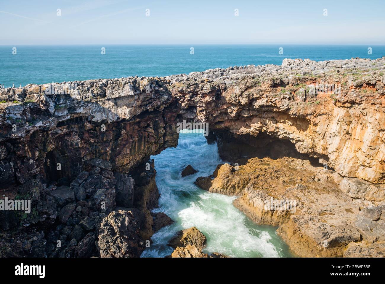 The rocky coastline of Cascais is famous for the cave named, The jaws ...