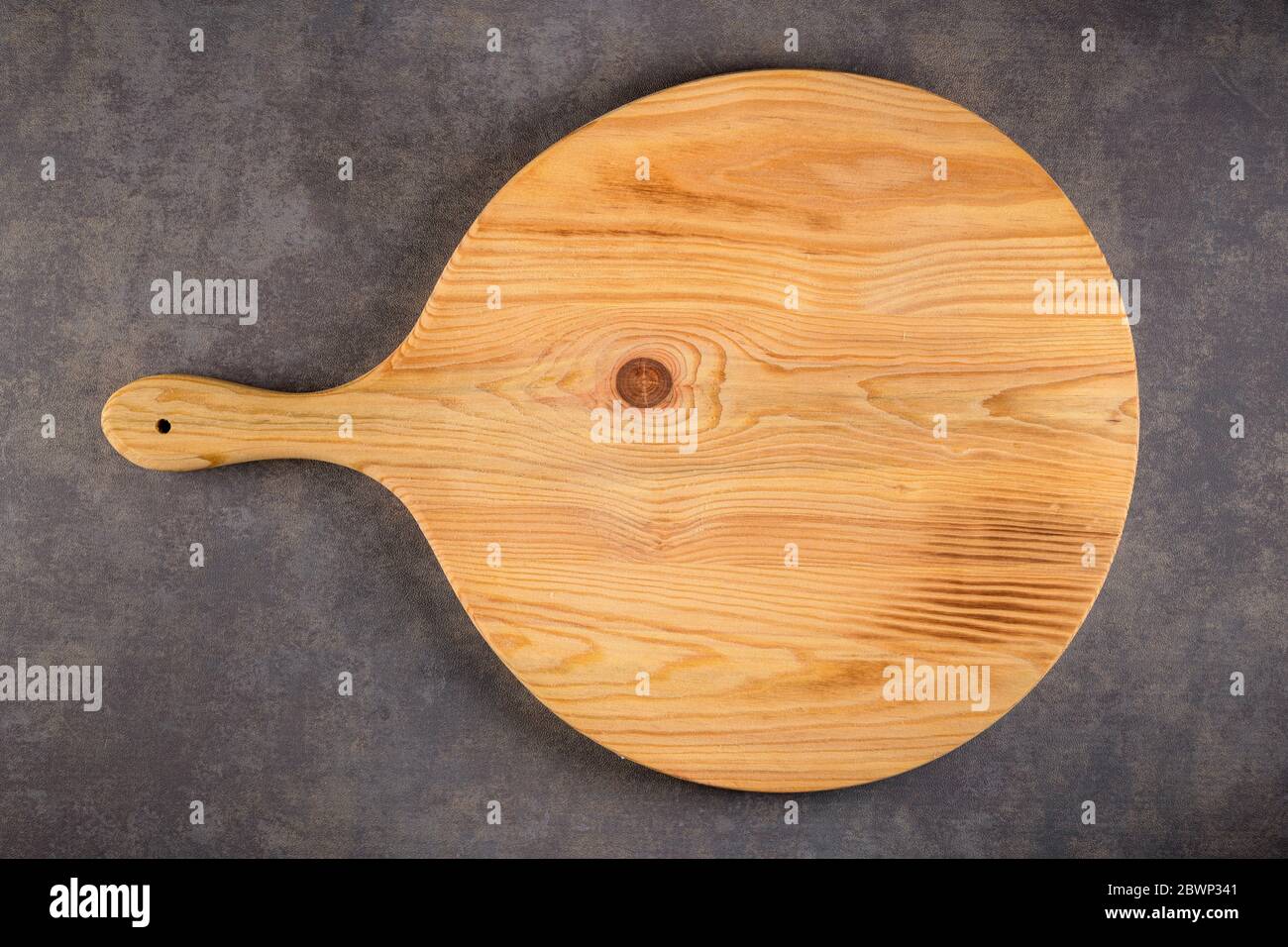 Top view of wooden cutting board on old concrete countertop Stock Photo ...