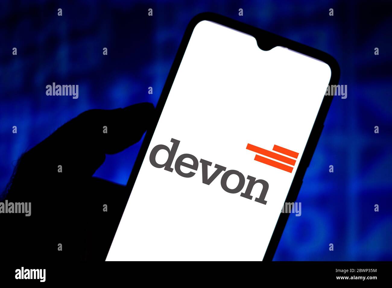 In this photo illustration the Devon Energy Corporation logo seen ...