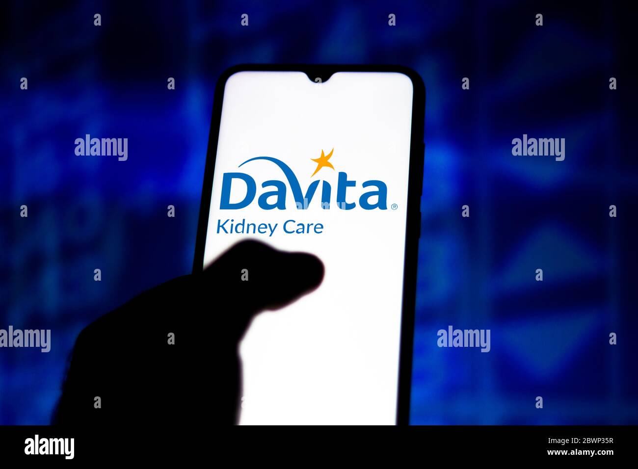 In this photo illustration the DaVita Inc logo seen displayed on a ...