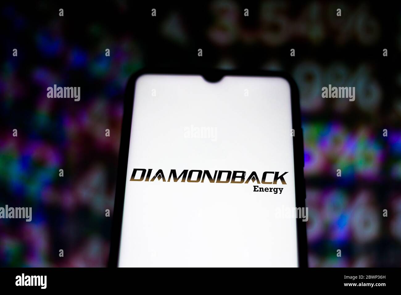 In this photo illustration the Diamondback Energy logo seen displayed ...