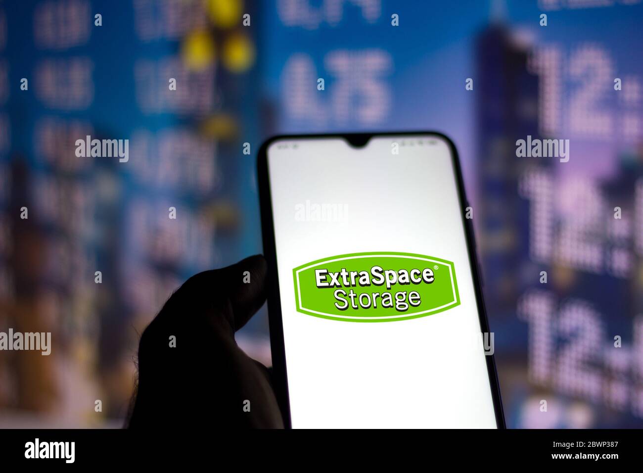 In this photo illustration the Extra Space Storage logo seen displayed ...