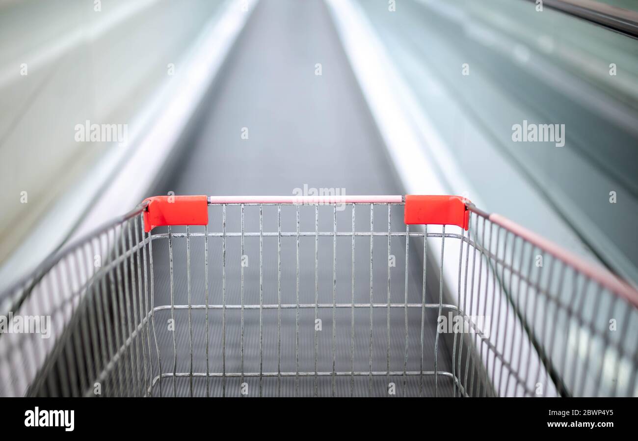The stainless steal shopping trolley or push cart on the elevator or ...