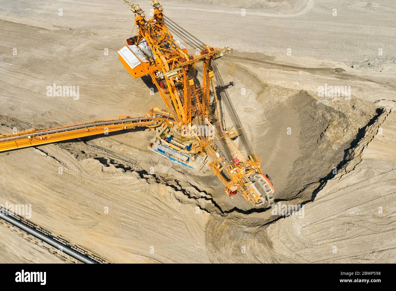 Huge bucket wheel excavator or mobile strip mining machine mining coal ...