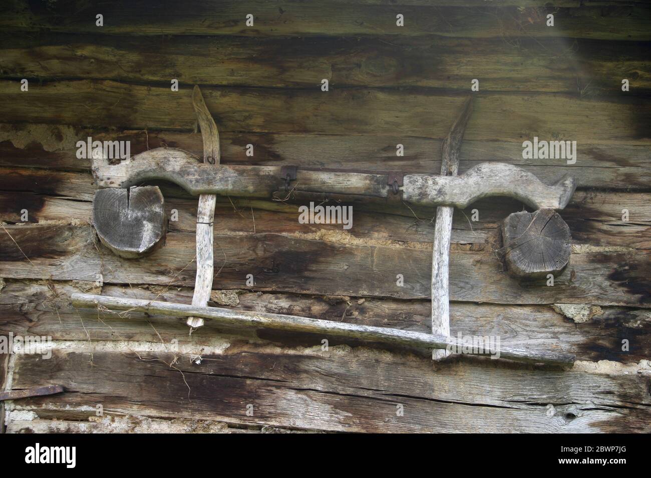 Wooden yoke on the wall of a barn in Romania's countryside Stock Photo ...