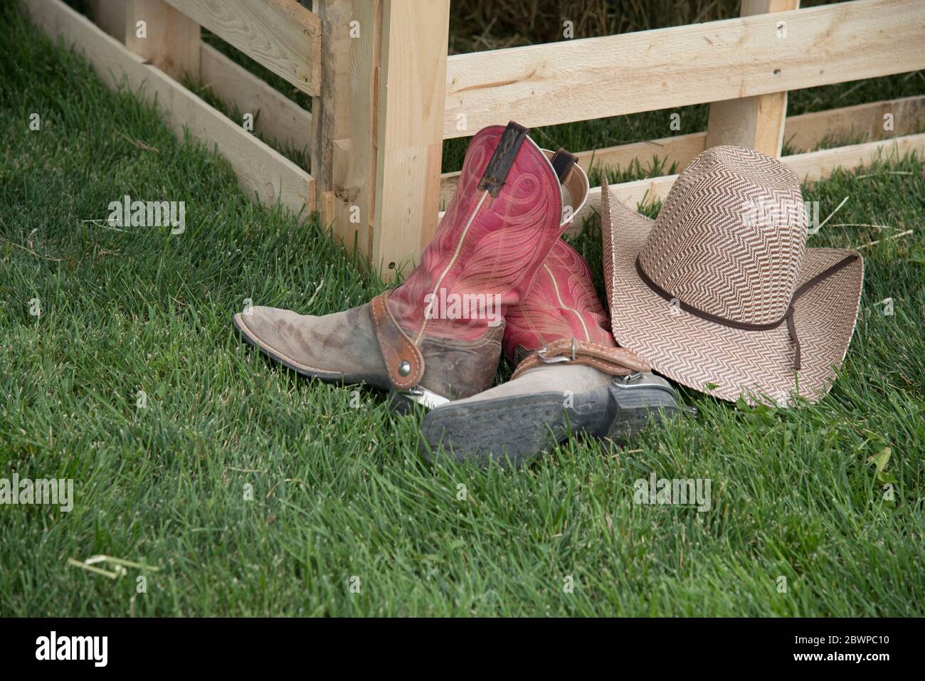 Cowboy boots and hat still life Stock Photo - Alamy