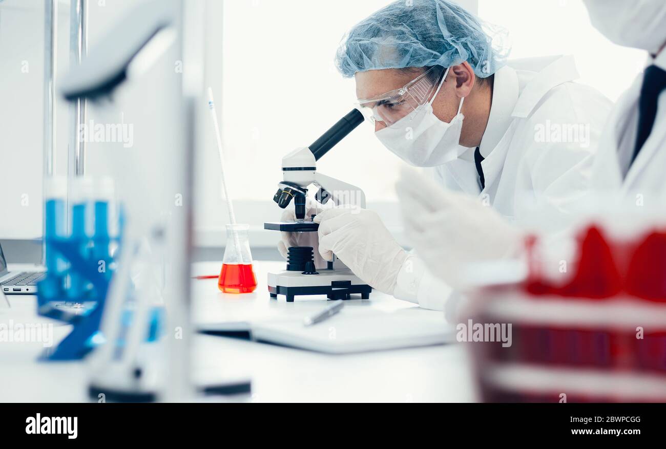 close up. scientist testing blood in the lab Stock Photo - Alamy