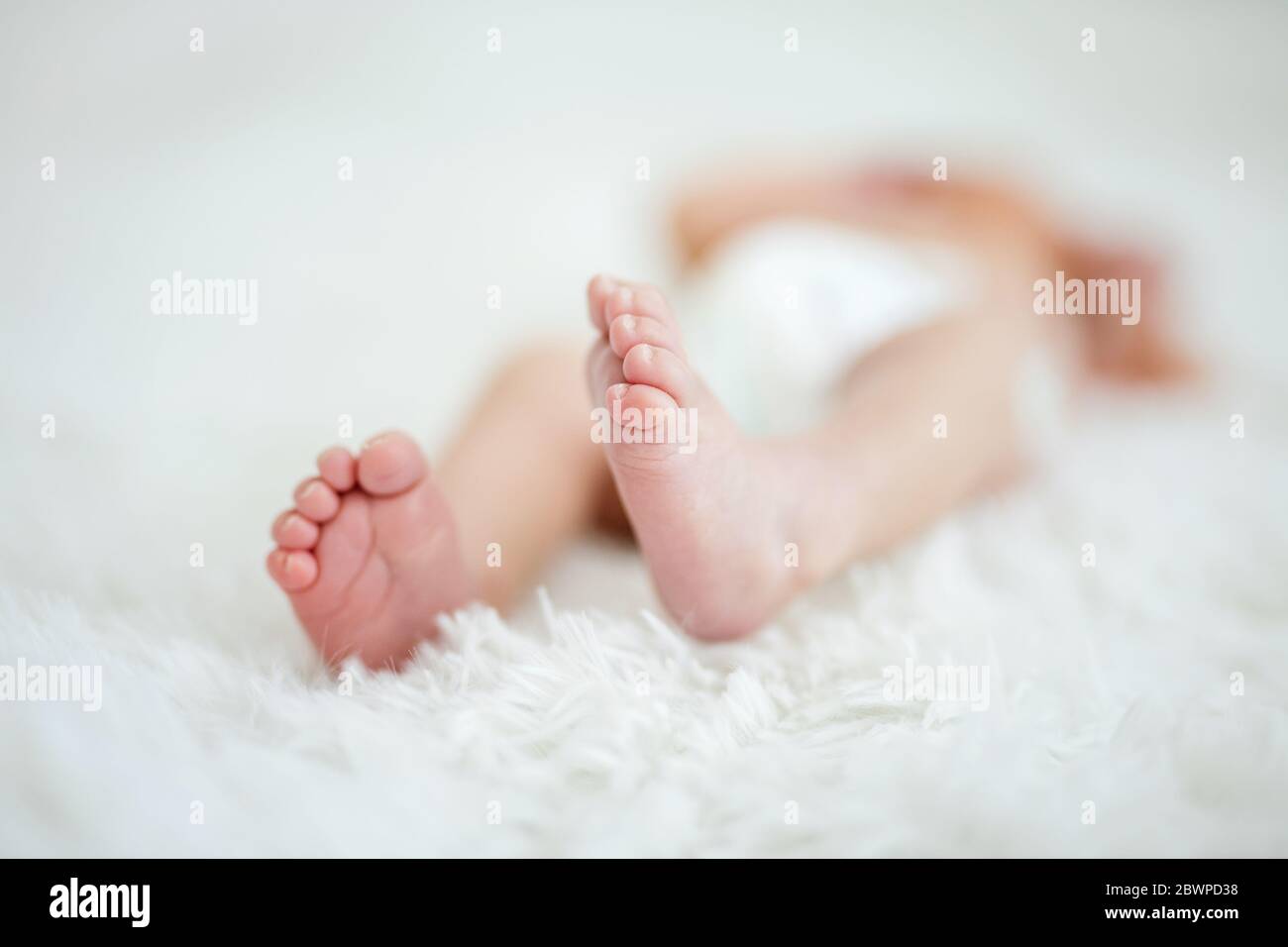 Newborn baby feet closeup, image with shallow depth of field Stock ...