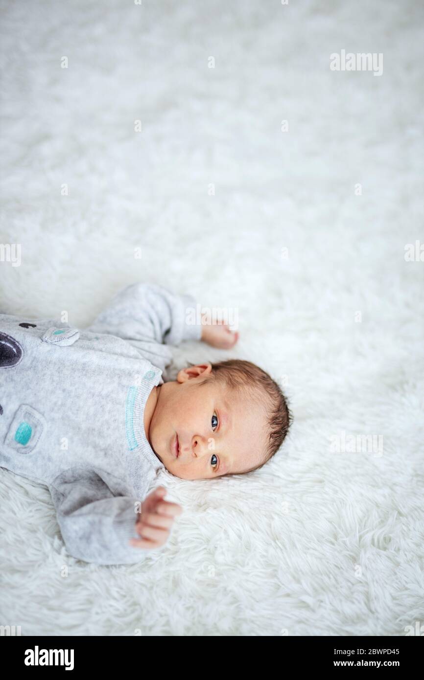 Baby moving arms hi-res stock photography and images - Alamy