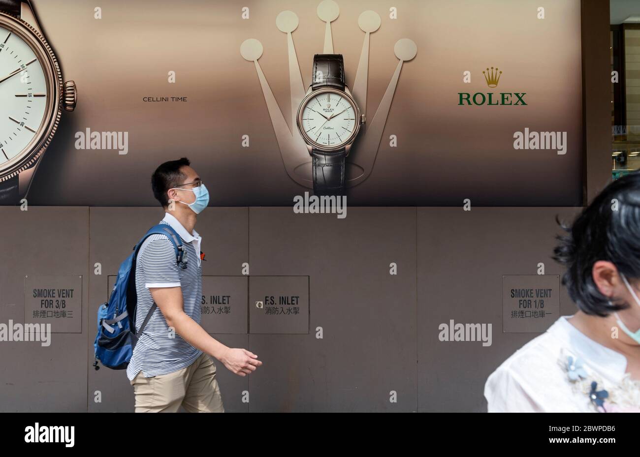Hong Kong, China. 29th May, 2020. A pedestrian using a face mask walks ...