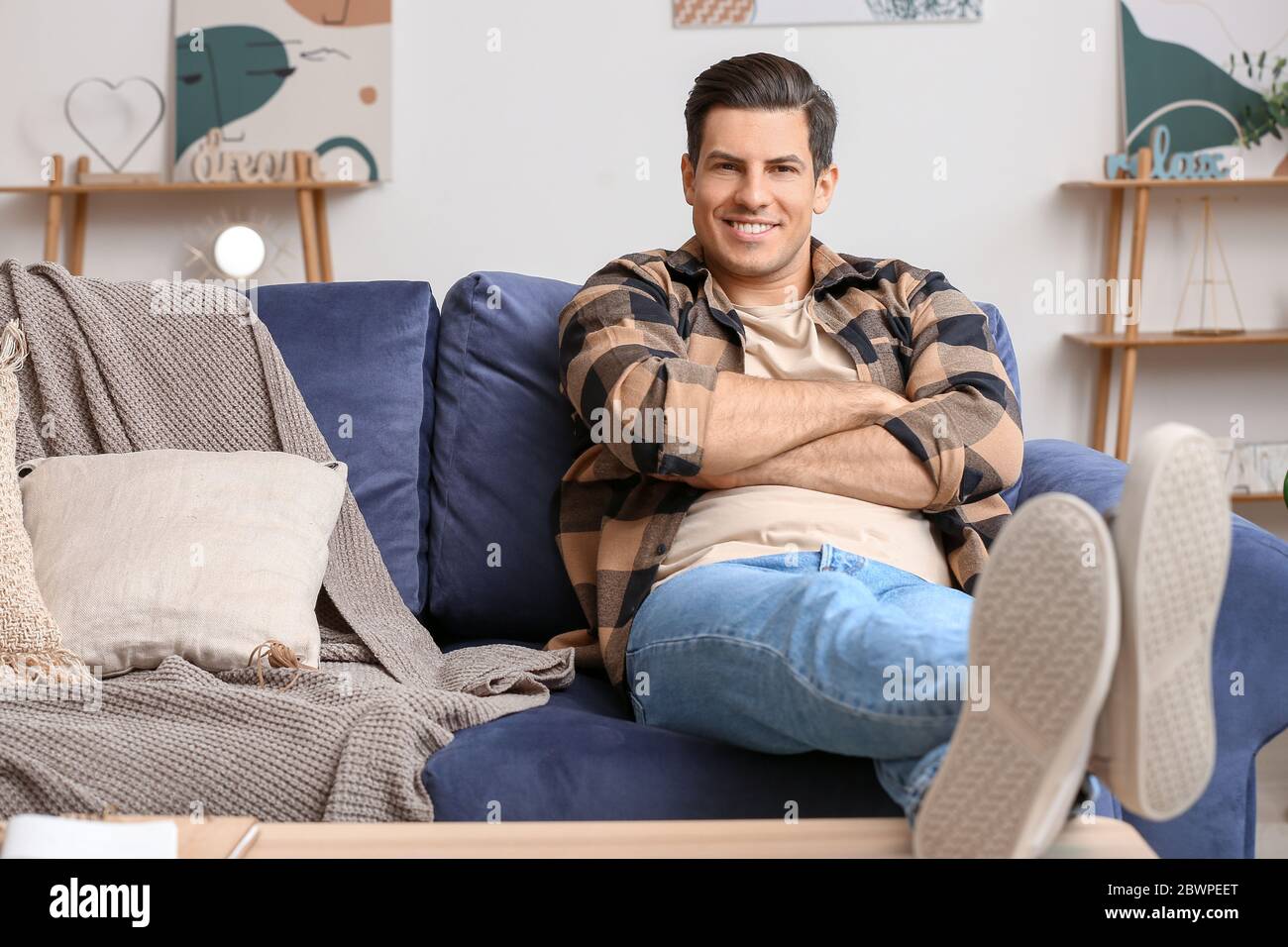 Lazy man spending day off at home Stock Photo - Alamy