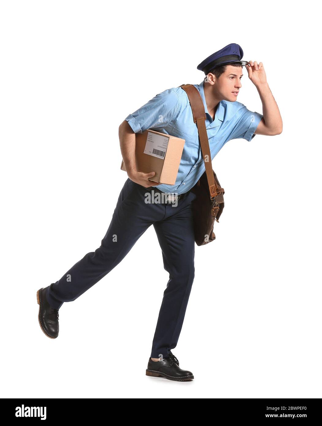 Handsome running postman on white background Stock Photo - Alamy