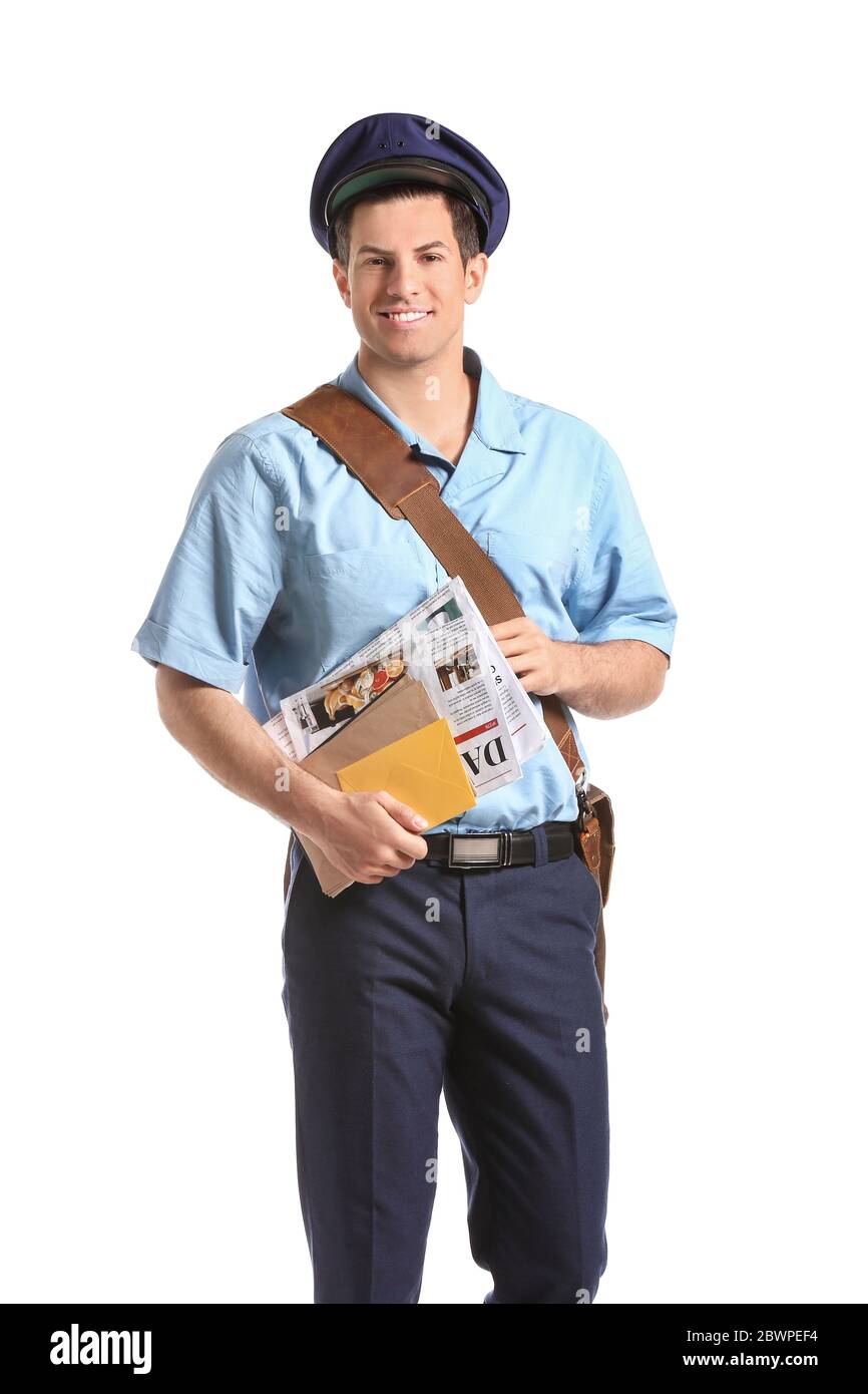 Handsome young postman on white background Stock Photo - Alamy