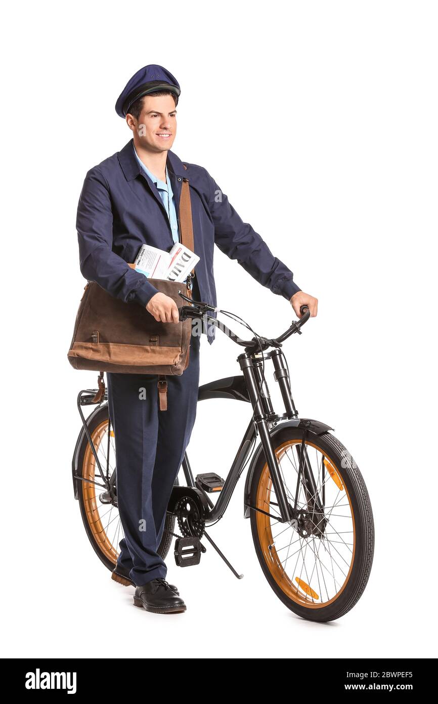 Handsome young postman with bicycle on white background Stock Photo - Alamy