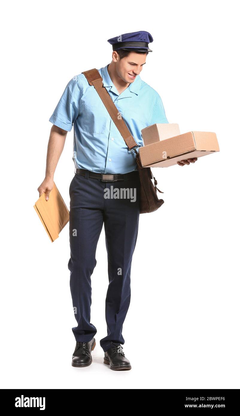 Handsome young postman on white background Stock Photo - Alamy