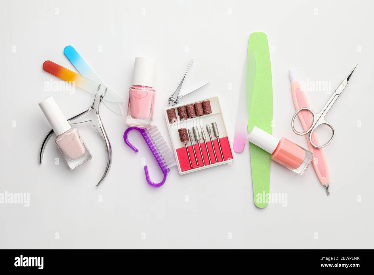 Supplies for manicure on white background Stock Photo - Alamy