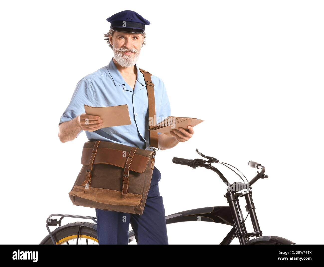 Handsome old postman with bicycle on white background Stock Photo - Alamy