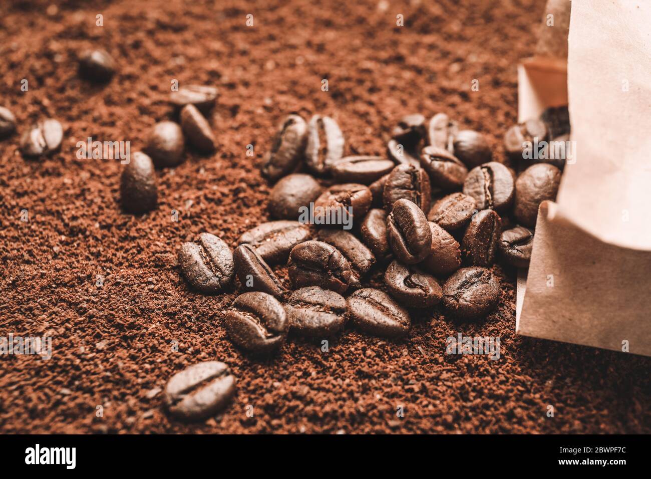 Paper bag with roasted coffee beans on powder Stock Photo - Alamy