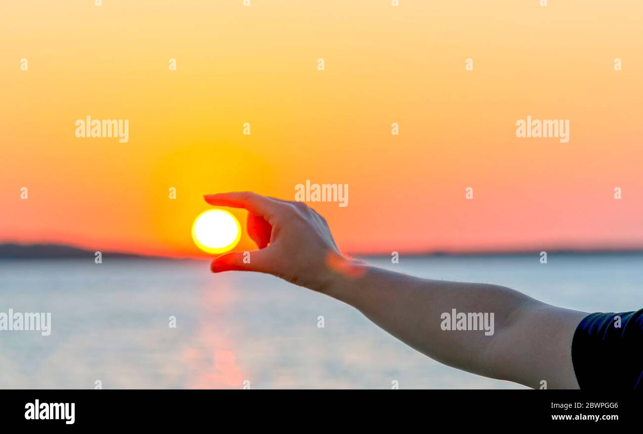 Woman silhouette catching hi-res stock photography and images - Alamy