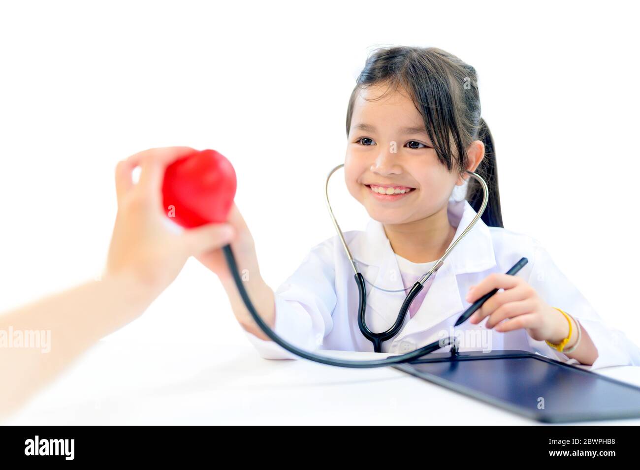 Asian kid as doctor and health care concept. Wellness and Self-care ...