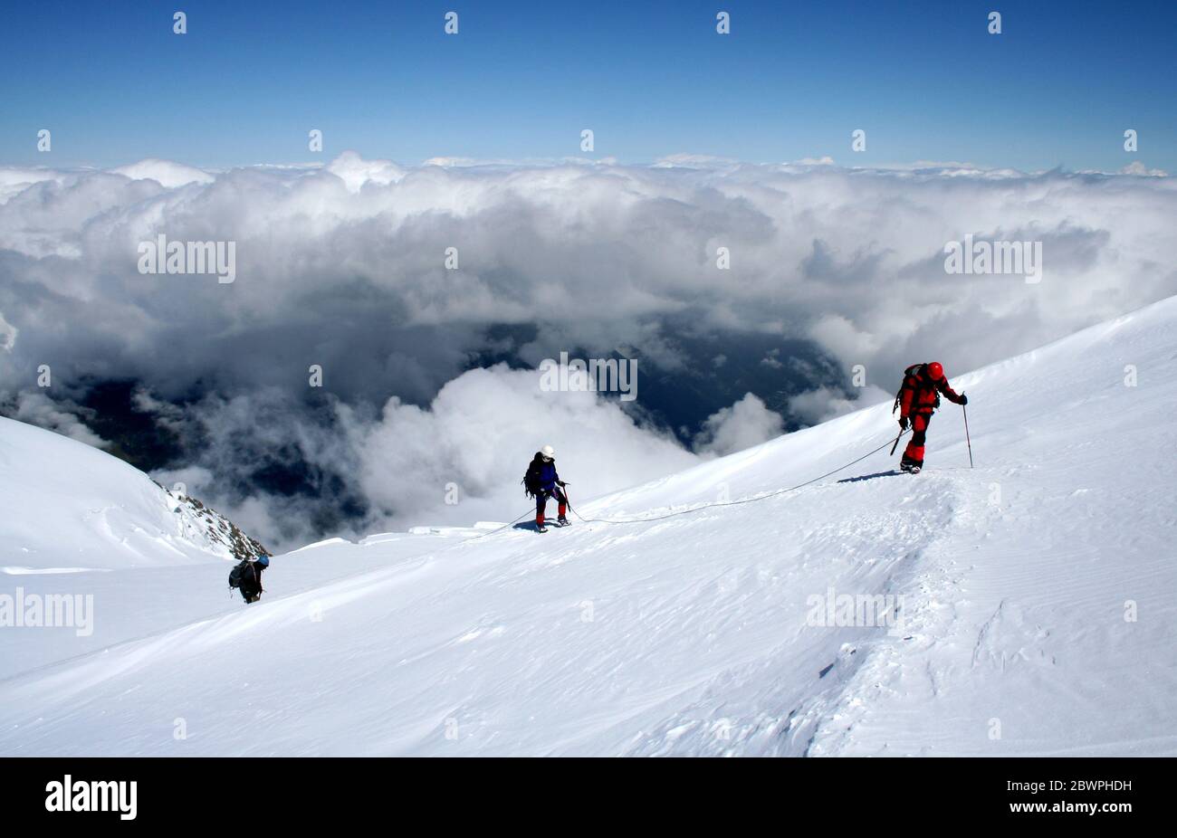 Mountaineers climbing Mont Blanc at Gouter Route in French Alps, France ...