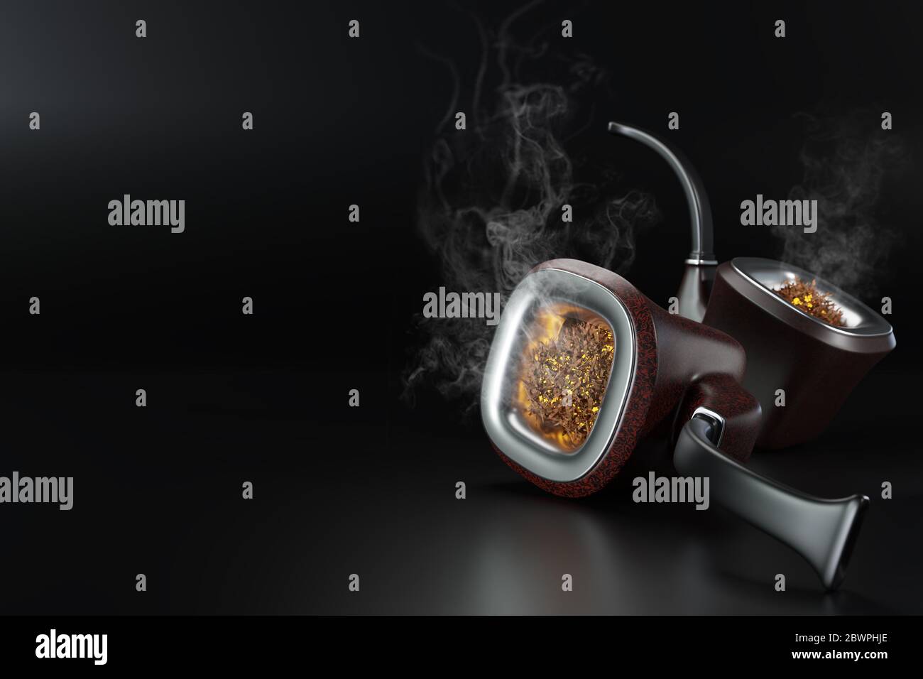 Two vintage pipe smoke placed on black background in dark. There is ...