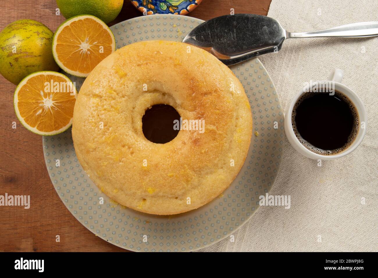 homemade orange cake in round shape with hole Stock Photo - Alamy