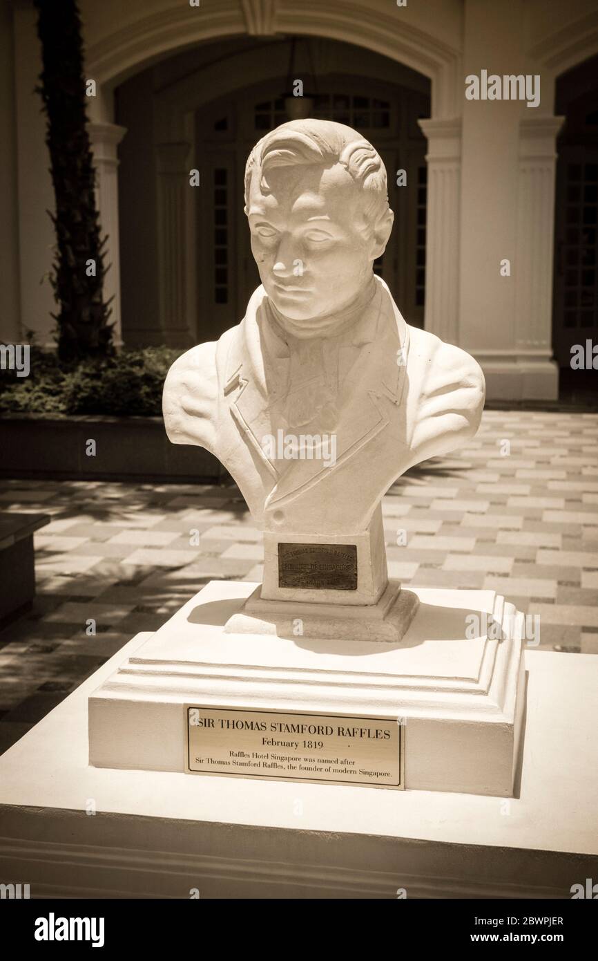 Marble statue of Sir Thomas Stamford Raffles (founder of modern Singapore) at the Raffles Hotel ...