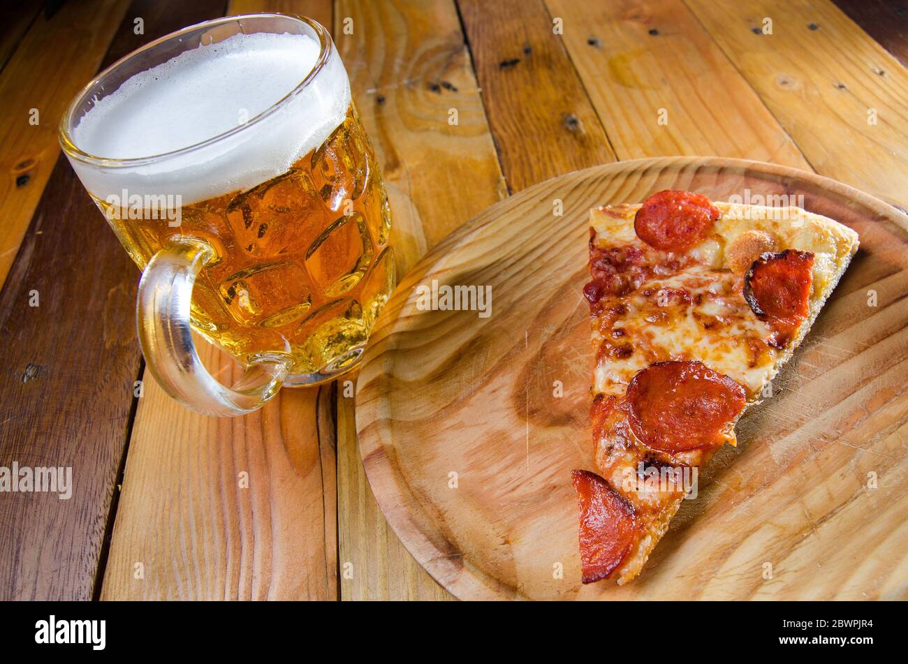 Pizza slice and beer hi-res stock photography and images - Alamy