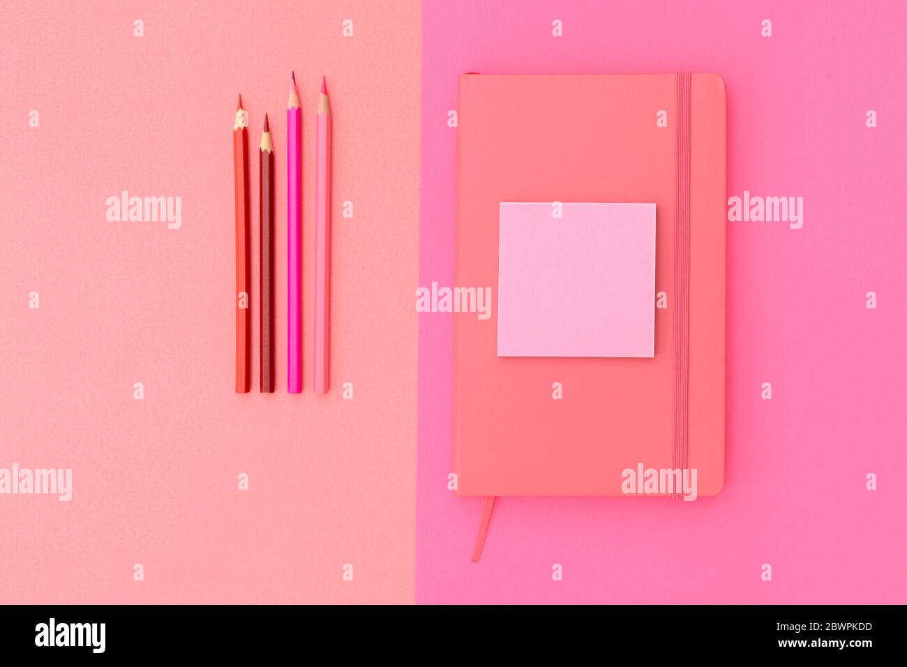 Pink notepad, pencil and marker on pink background. Flat lay. Concept ...