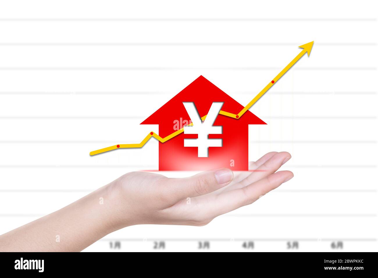 Hand holds rising red arrow renminbi symbol, blurred report graph Stock ...