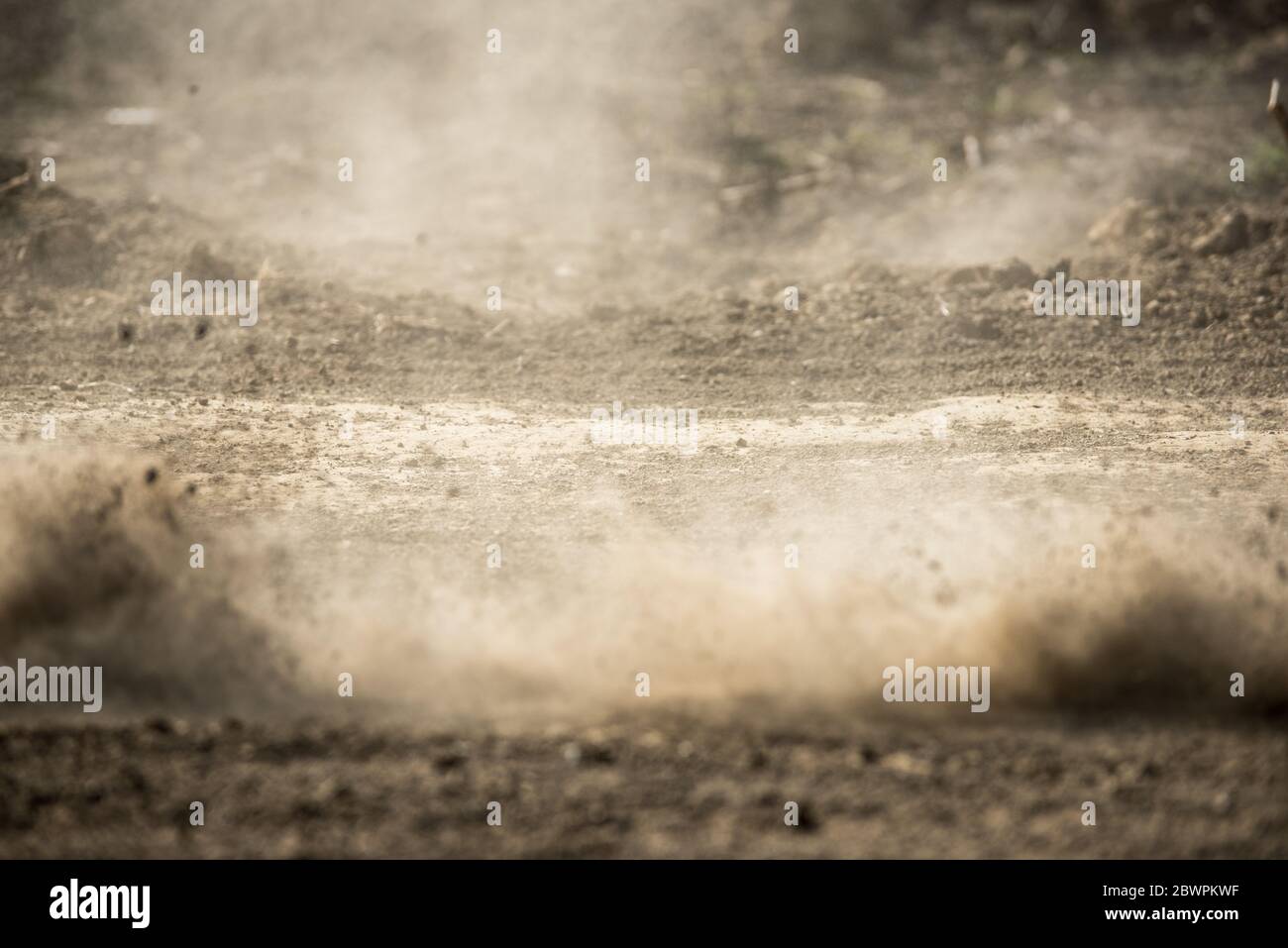 dirt fly after motocross roaring by Stock Photo - Alamy