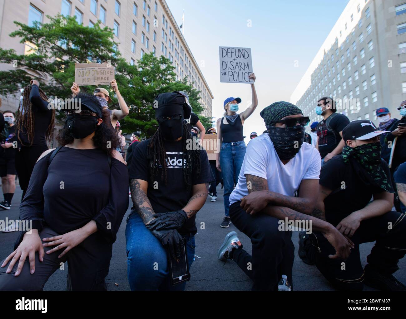 Washington, DC, USA. 2nd June, 2020. Demonstrators taking a knee while ...