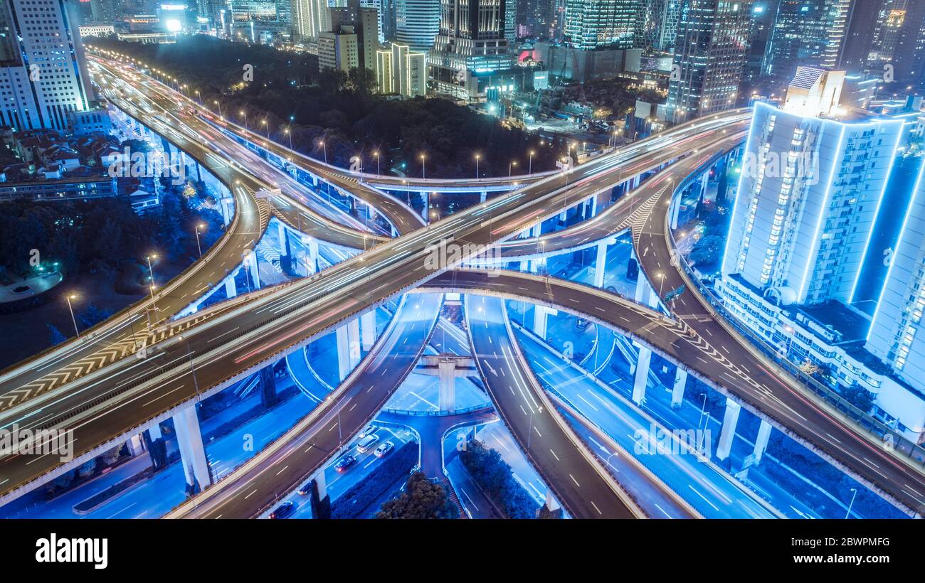 aerial view of highway interchange at night Stock Photo - Alamy