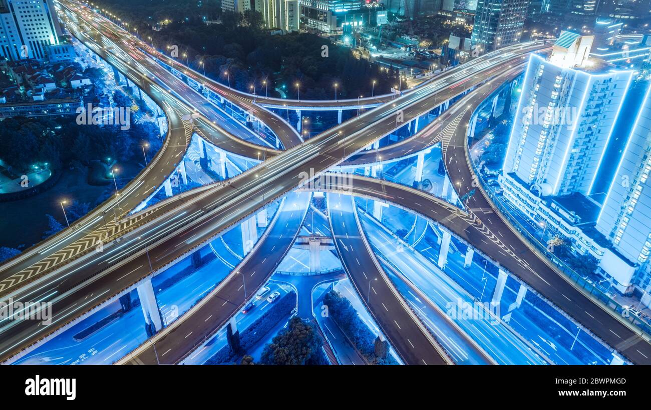 aerial view of highway interchange at night Stock Photo - Alamy