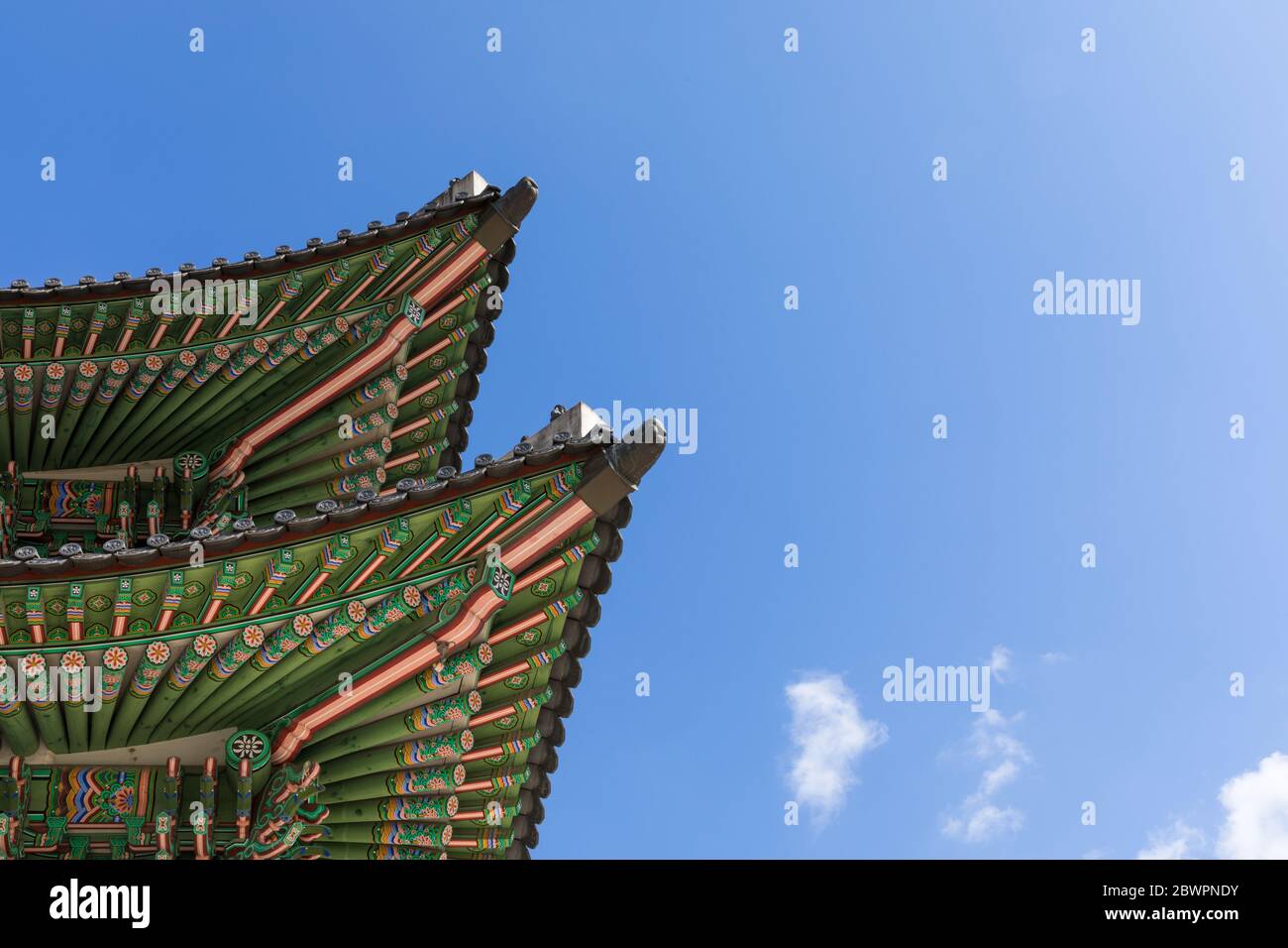 Korean traditional palace roof and blue sky Stock Photo - Alamy