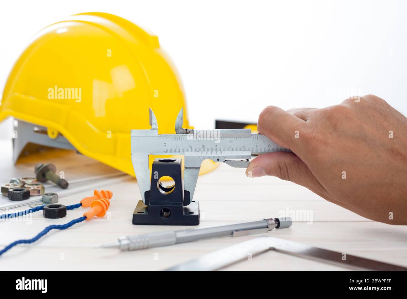 measuring the dimensions of part with metal vernier caliper, vernier ...