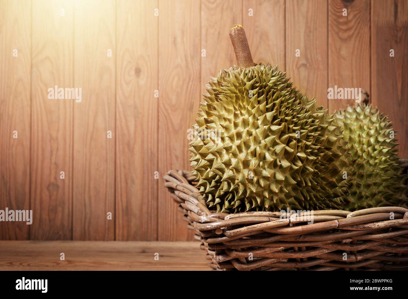 Mon Thong durian fruit on wooden plank background. Regarded by many ...