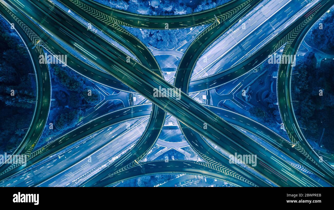 aerial view of highway interchange at night Stock Photo - Alamy