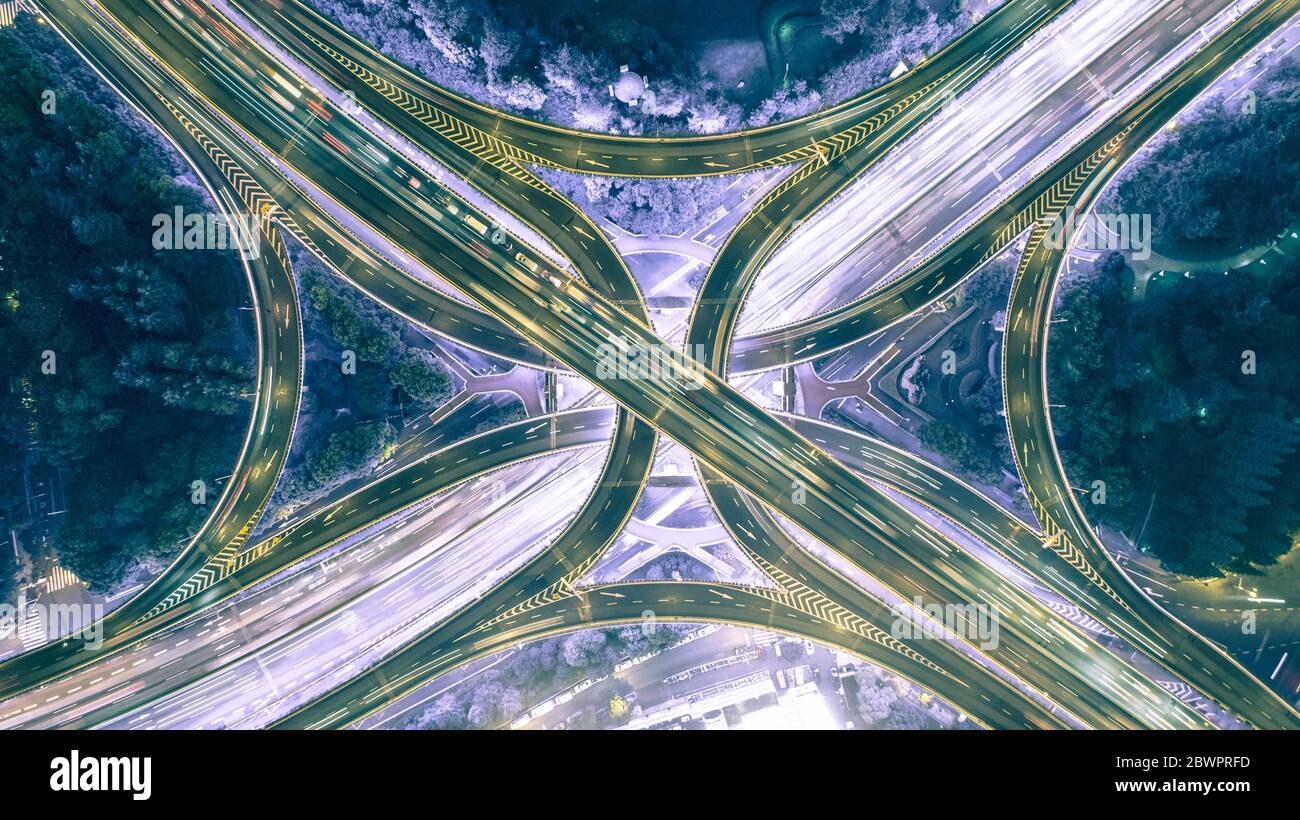 aerial view of highway interchange at night Stock Photo - Alamy