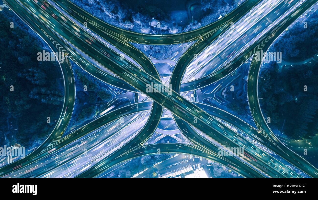 aerial view of highway interchange at night Stock Photo - Alamy