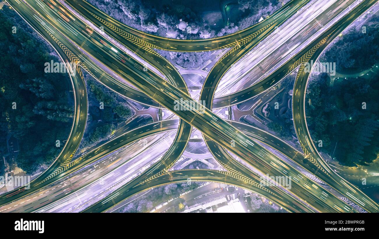 aerial view of highway interchange at night Stock Photo - Alamy