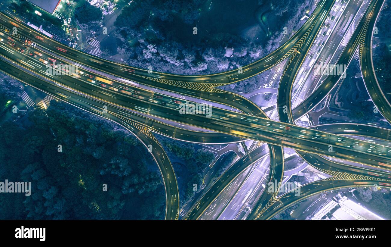 aerial view of highway interchange at night Stock Photo - Alamy