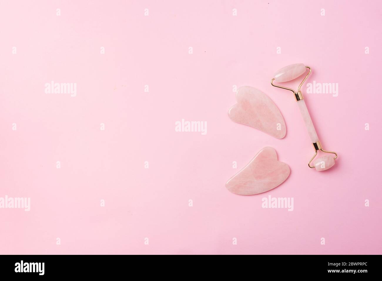 Pink gua sha facial massage roller. Anti age, lifting, toning face ...