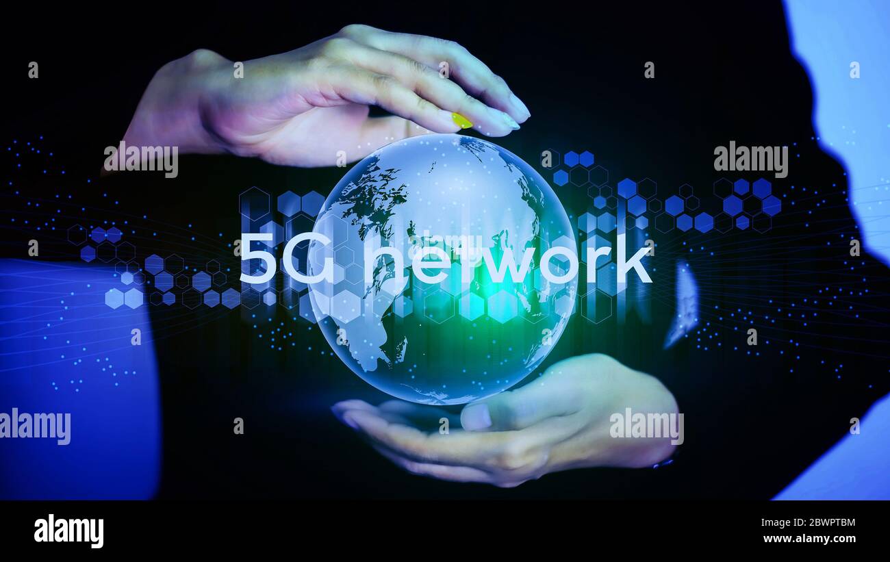 Multiple exposures of Businesswomen holding wold globe for new ...