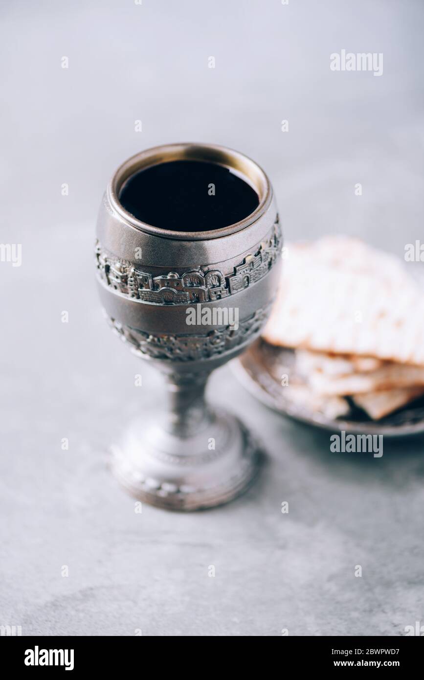 Jewish kiddush wine cup for passover with matzot, matzo bread. Pesah ...