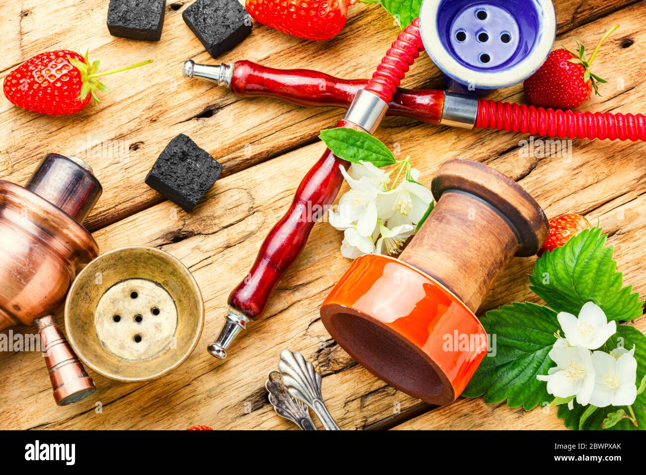 Oriental smoking shisha with strawberry tobacco. Berry hookah tobacco ...