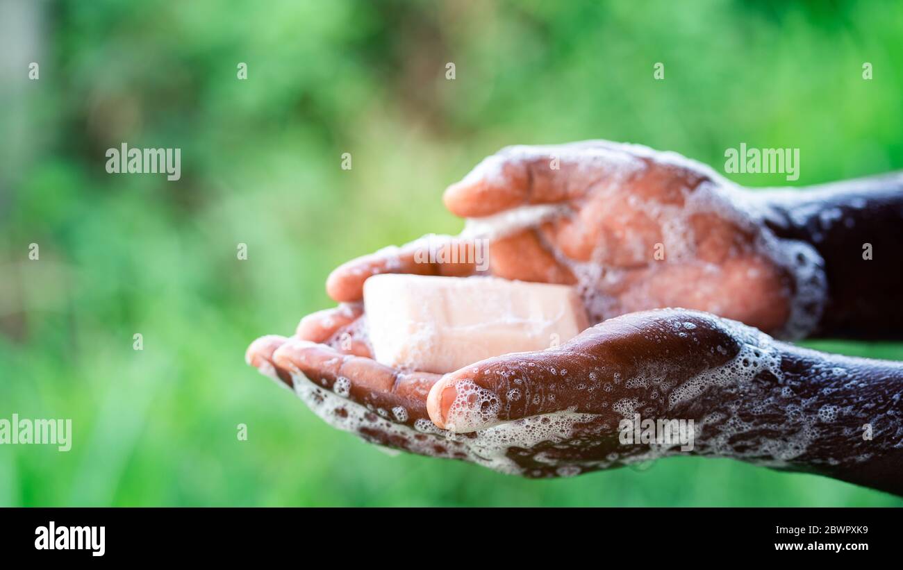 African hands soap hi-res stock photography and images - Alamy